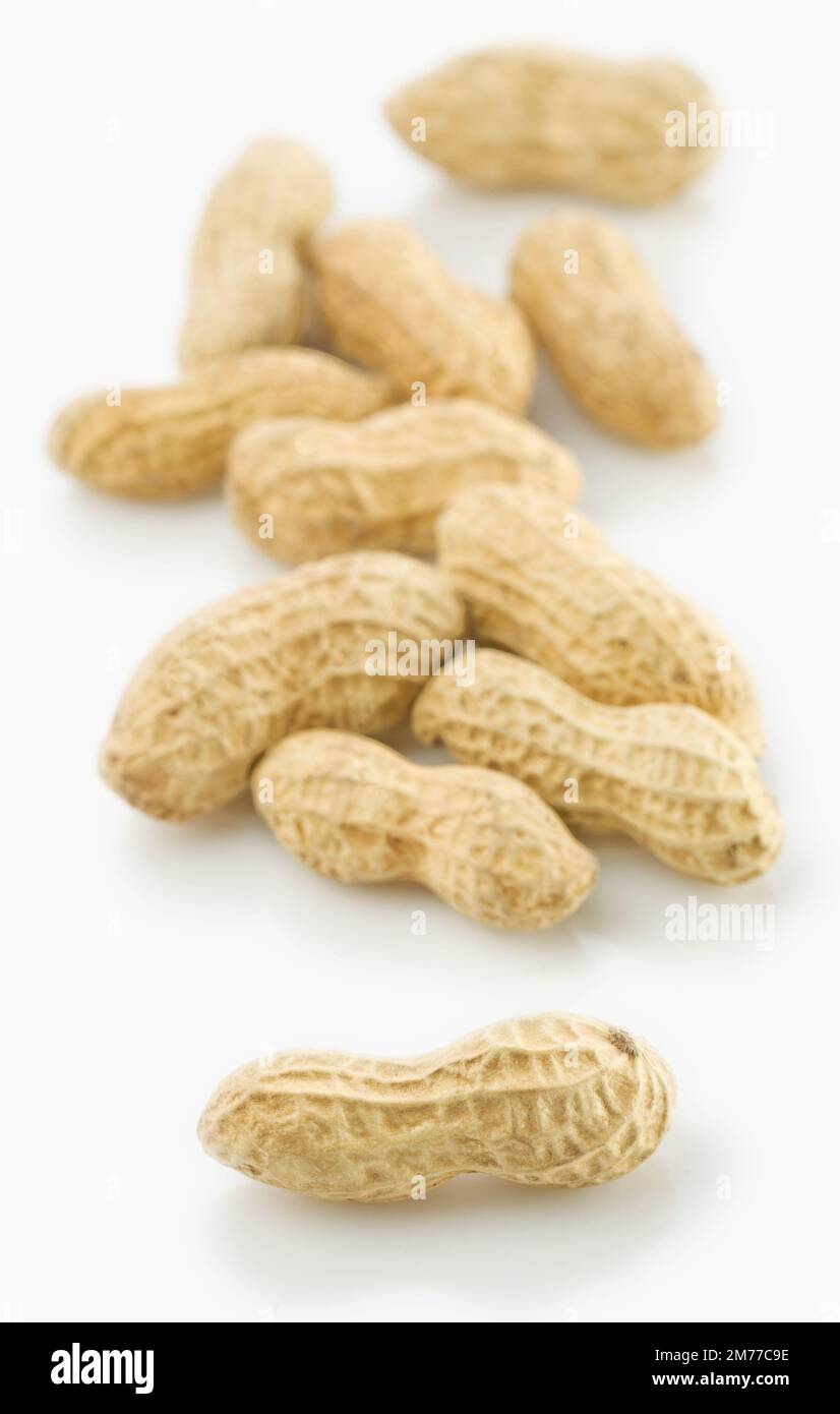 peanuts on gray background isolated Stock Photo - Alamy