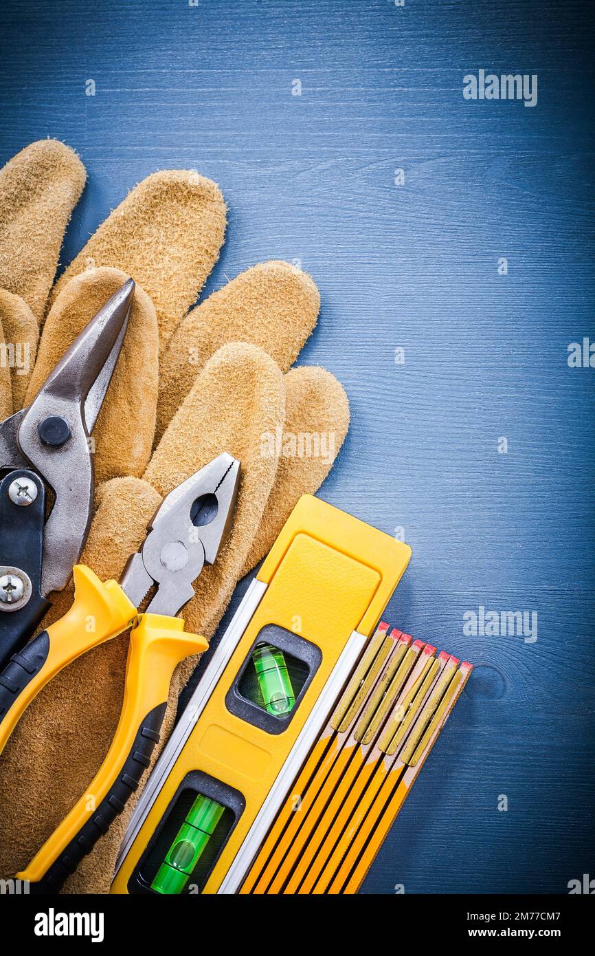 Pliers sharp tin snips wooden meter construction level protective ...