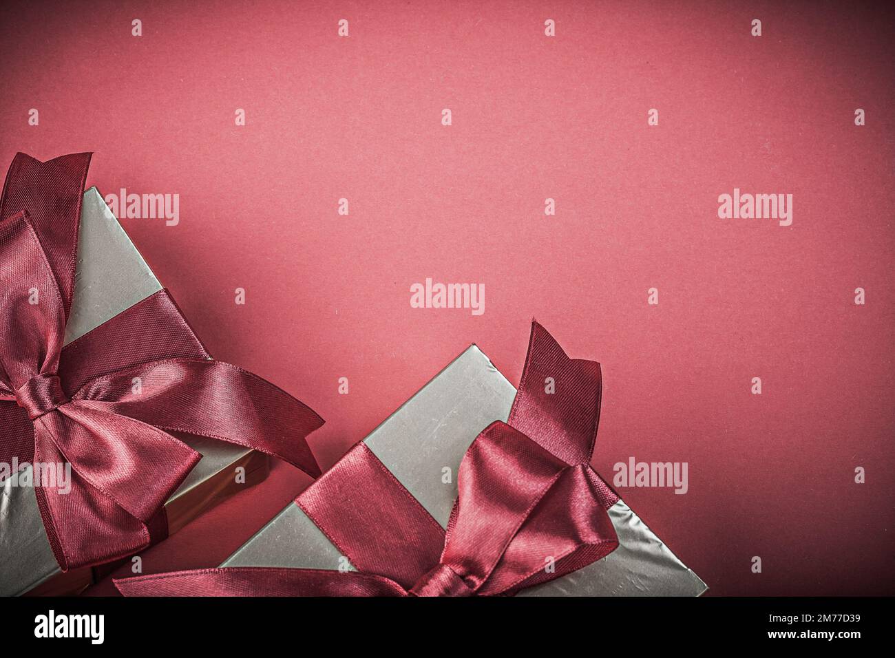 Present boxes on red background top view holidays concept Stock Photo ...