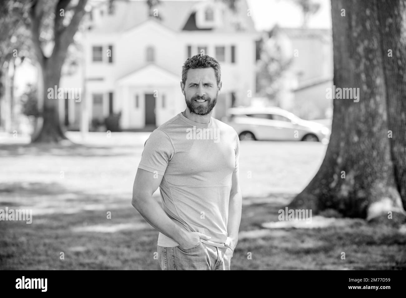American man standing near Black and White Stock Photos & Images - Alamy