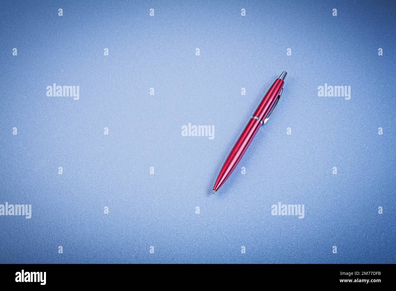 Red ballpoint pen horizontal version office concept Stock Photo - Alamy