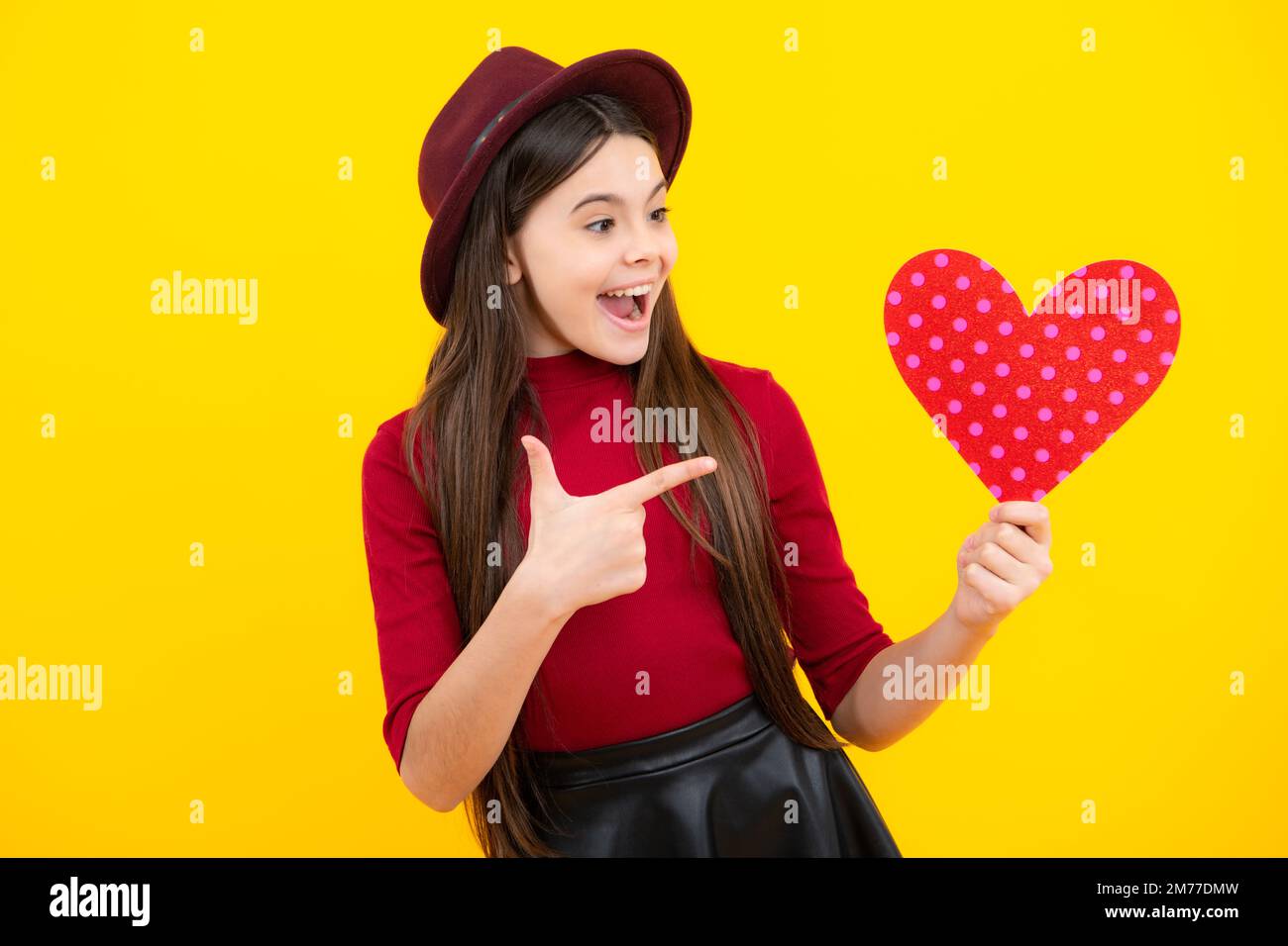 Lovely child girl 12, 13, 14 years old with shape heart love holiday ...