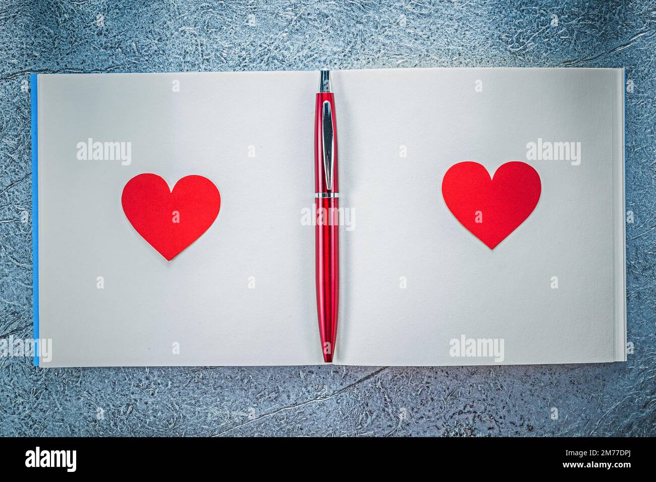Red hearts biro pen clean notepad on metallic background education ...