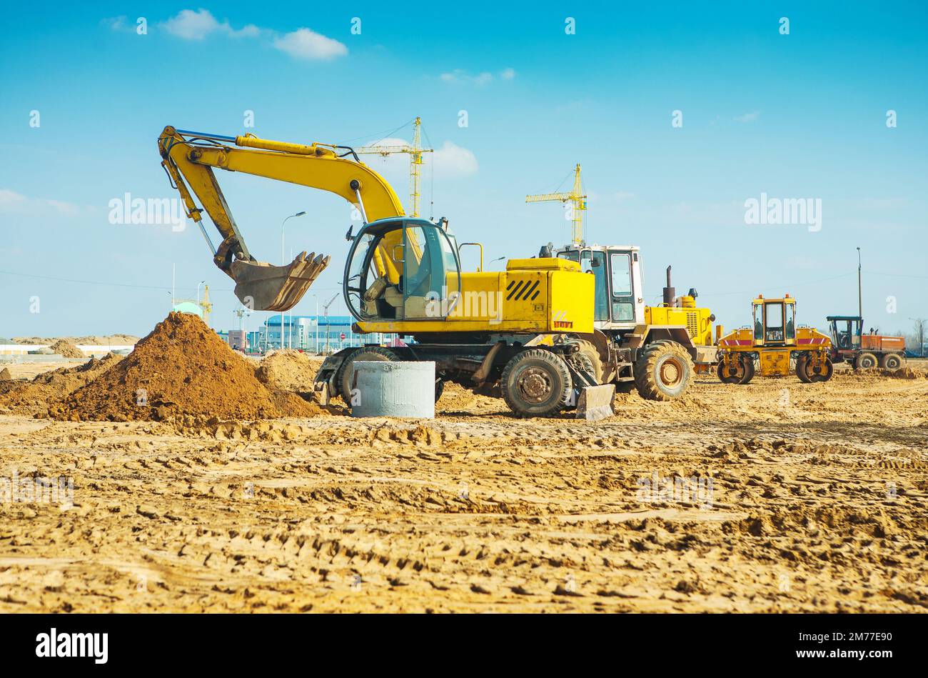 row of construction mashines Stock Photo - Alamy