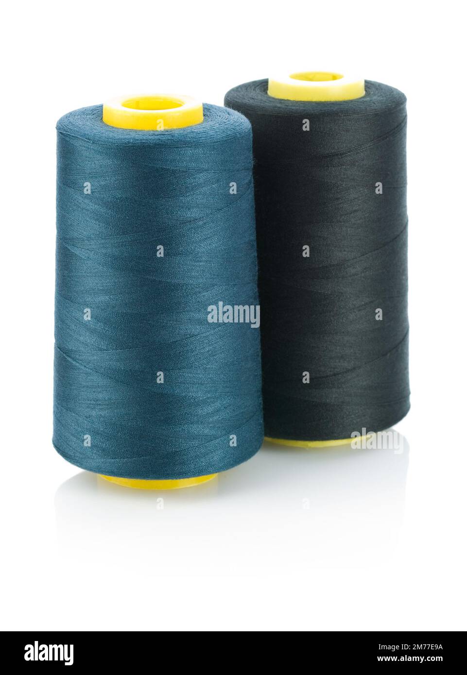 rolls of dark string isolated Stock Photo - Alamy