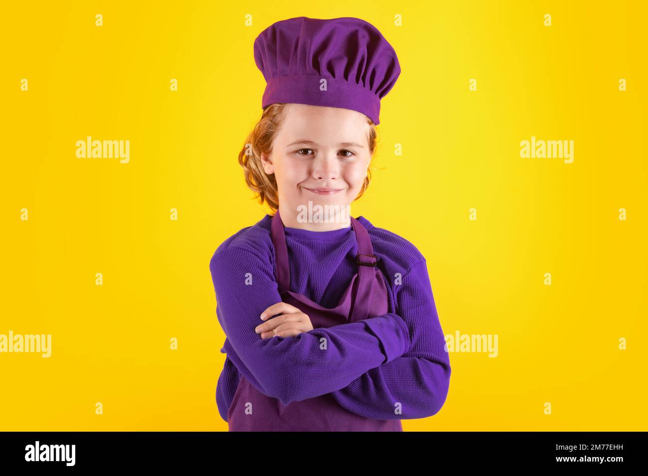 Kid chef cook, studio portrait. Children cooking. Kid boy with apron ...