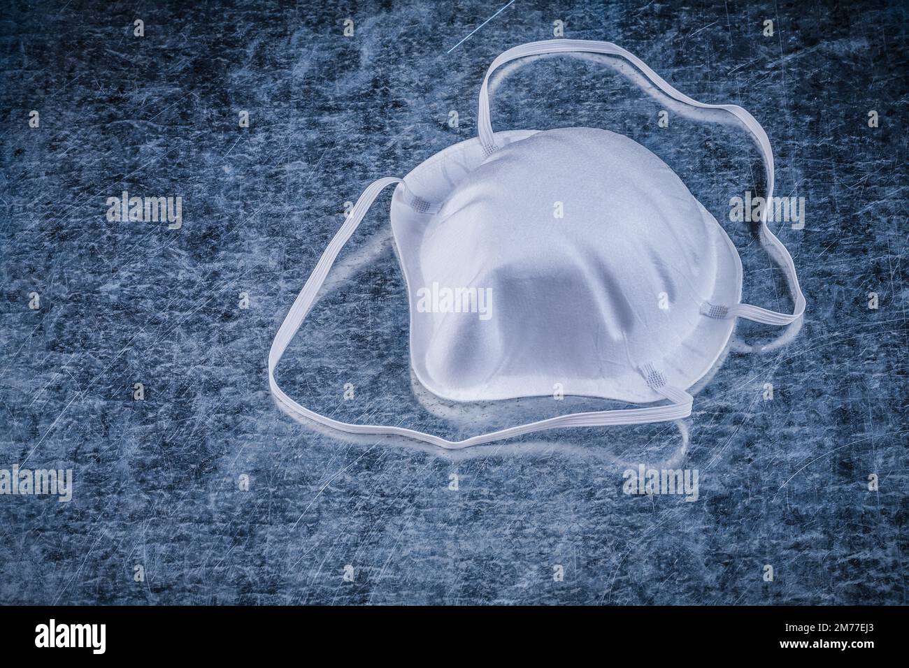 Safety dust mask on metallic background construction concept Stock ...