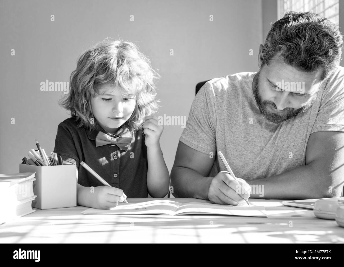 Child writing to father Black and White Stock Photos & Images - Alamy