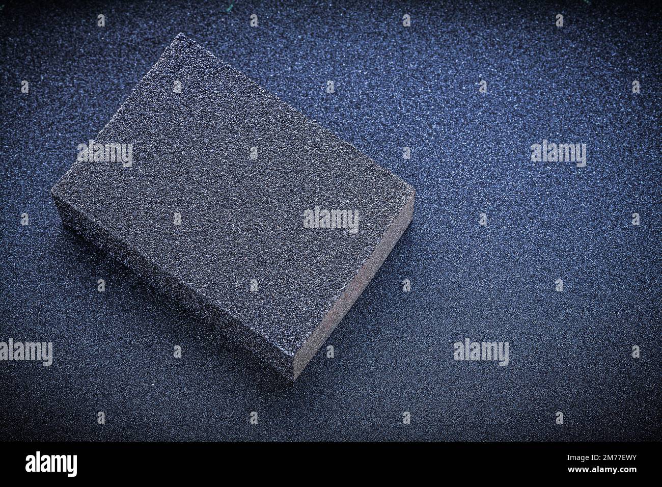 Sanding sponge on glass- paper abrasive tools Stock Photo - Alamy