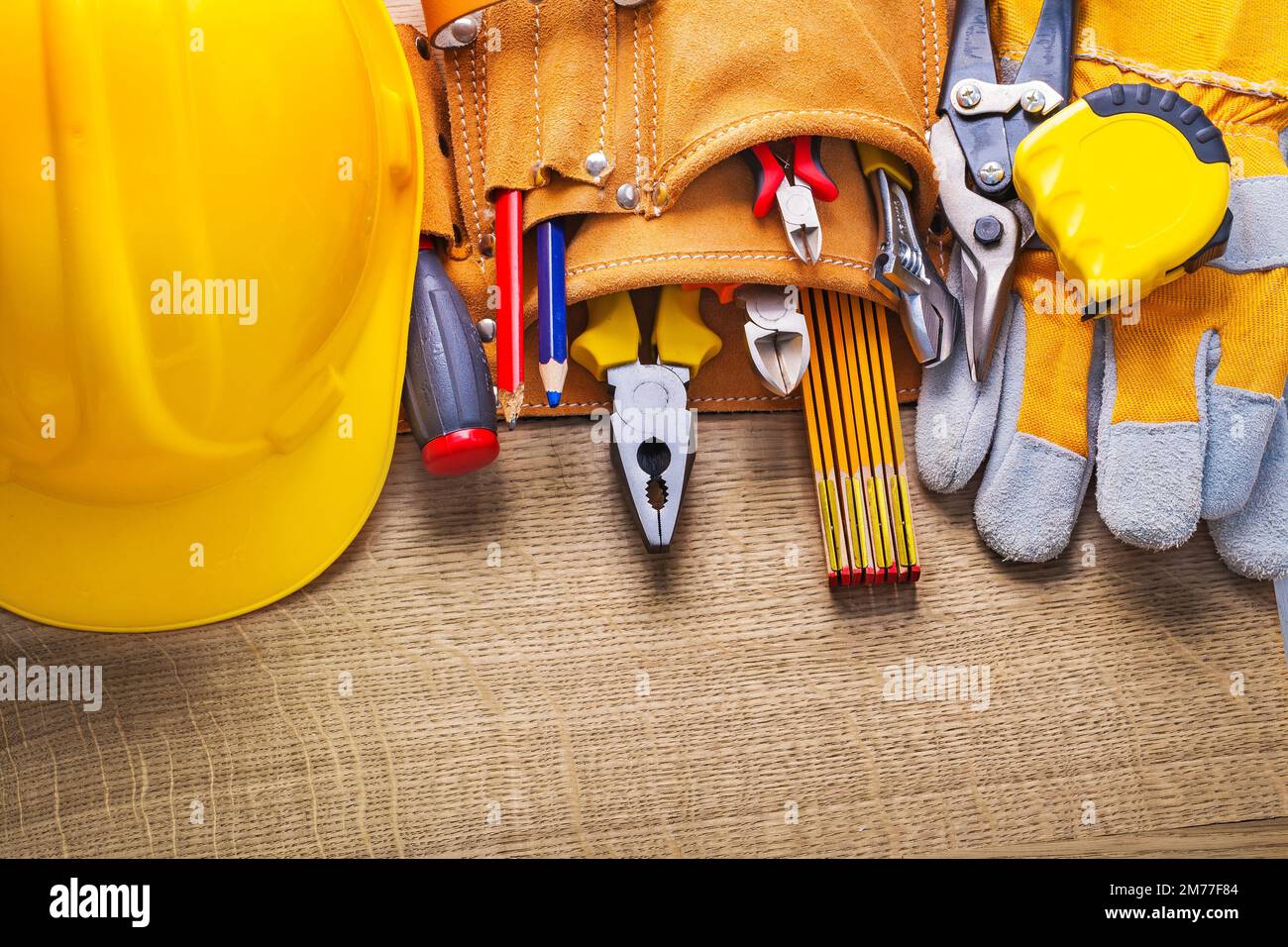 set of construction tools in toolbelt Stock Photo - Alamy