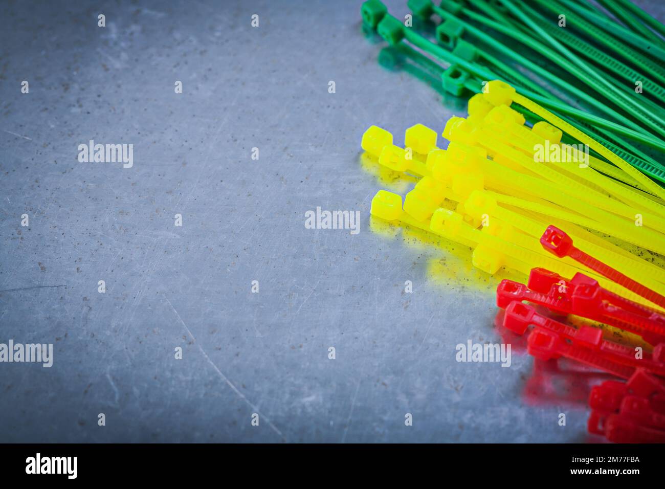 Set of plastic cable ties on scratched metallic background Stock Photo ...