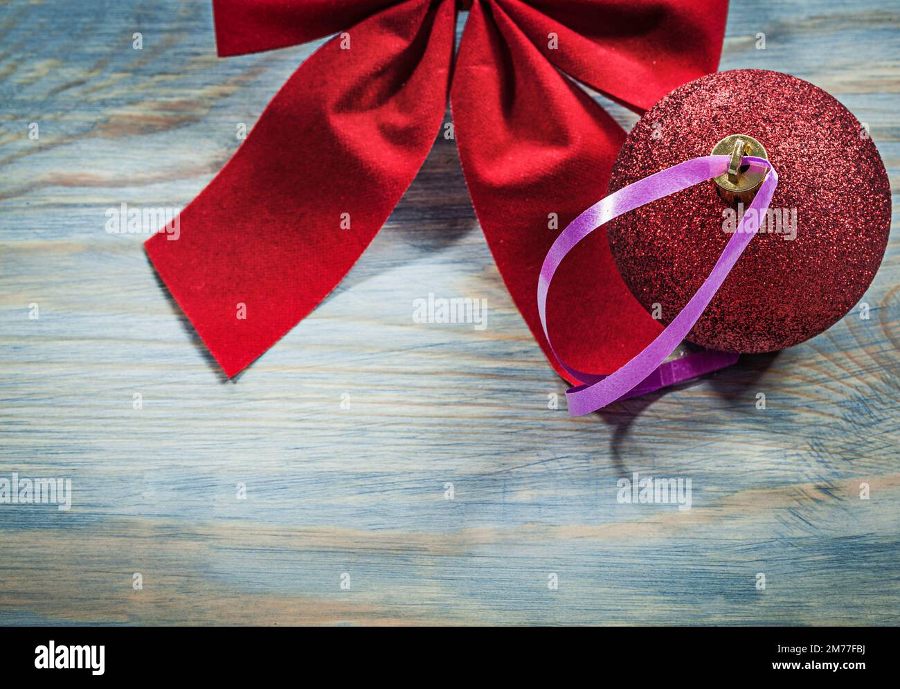 Set of red Christmas bow ball on wooden board holidays concept Stock ...