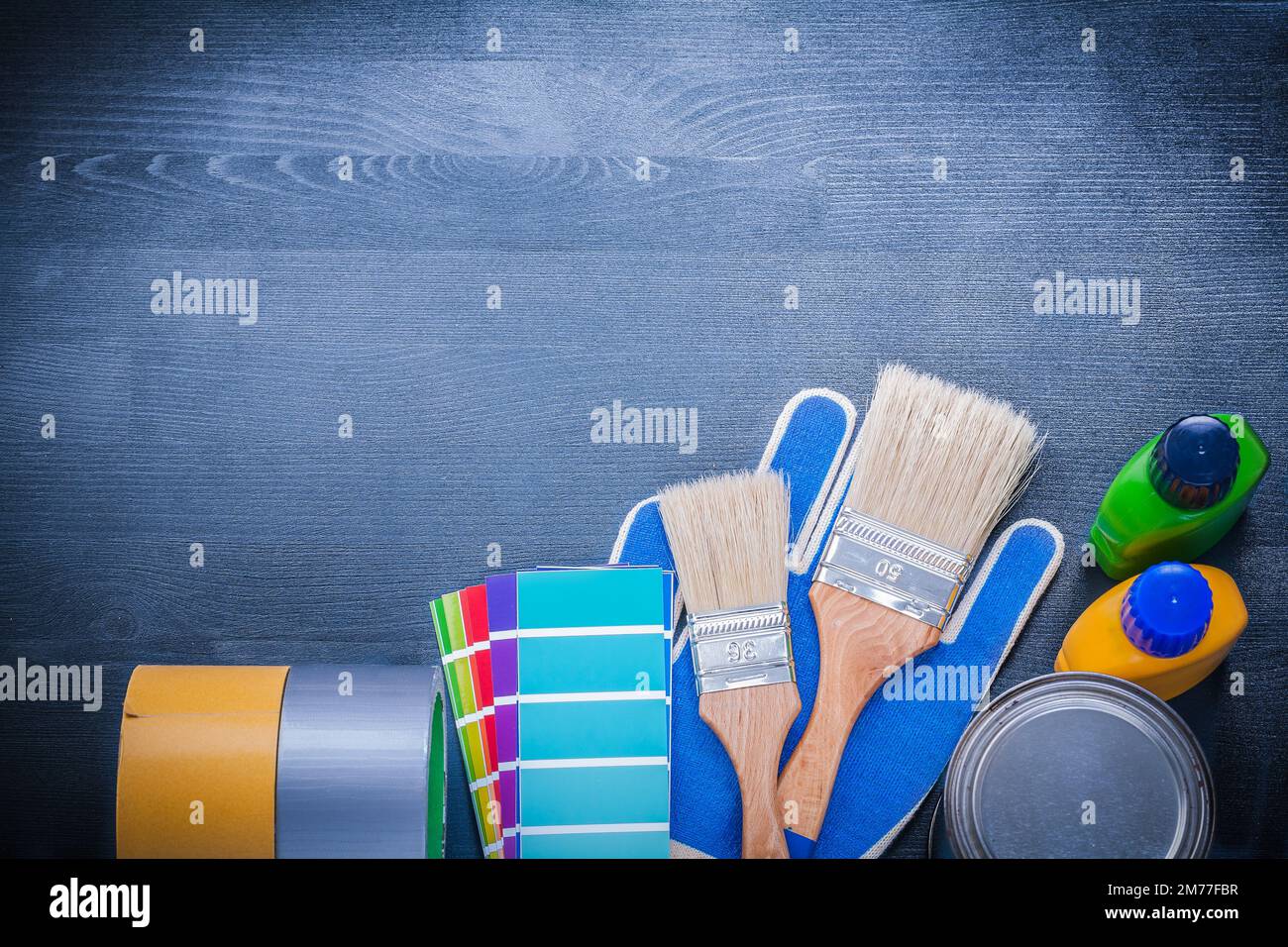Set of painting tools on wooden board construction concept Stock Photo ...