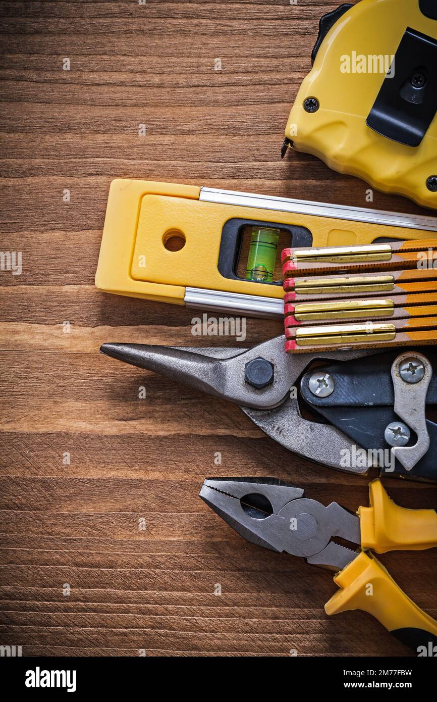 Set of pliers tape-measure steel cutter construction level wooden meter ...