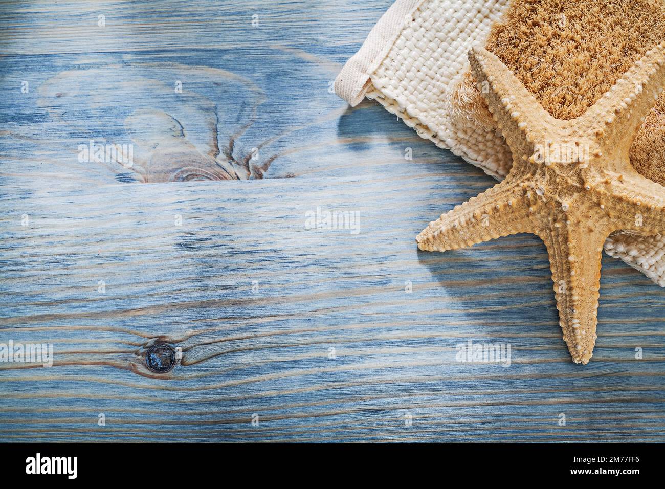 Set of starfish wisp of bast on wooden board healthcare concept Stock ...