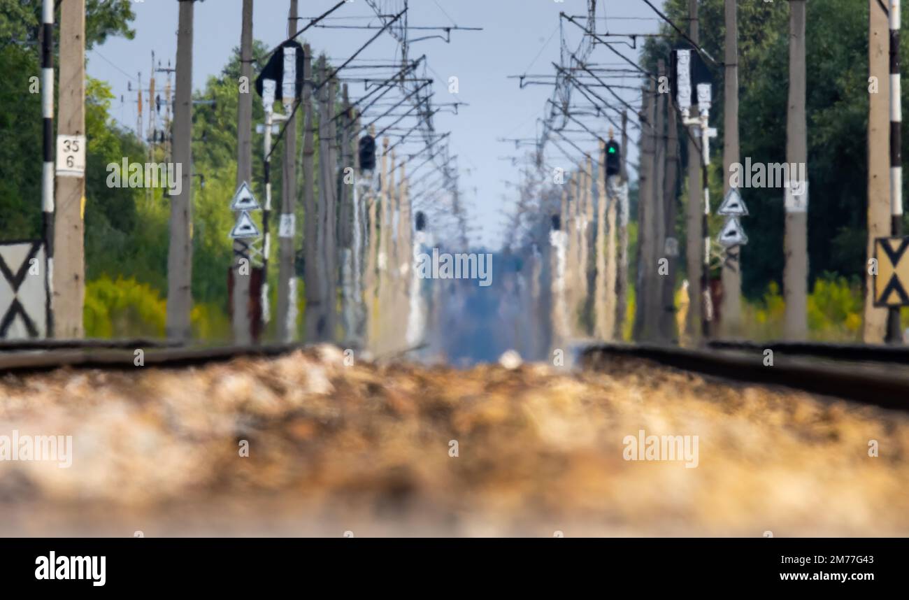 Air ripple over railroad tracks on a hot summer day. Super low angle ...