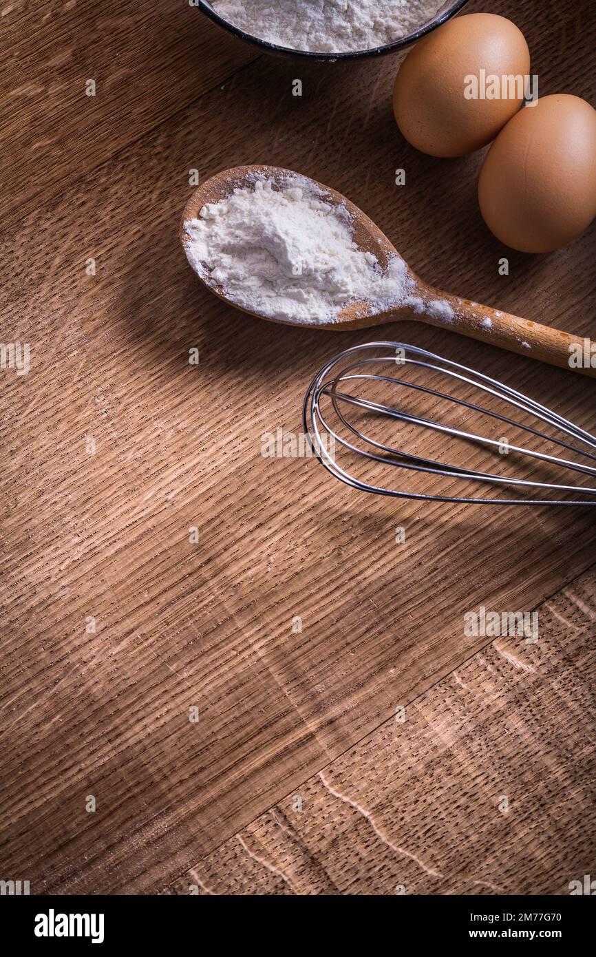 spoon with flour corolla eggs Stock Photo - Alamy