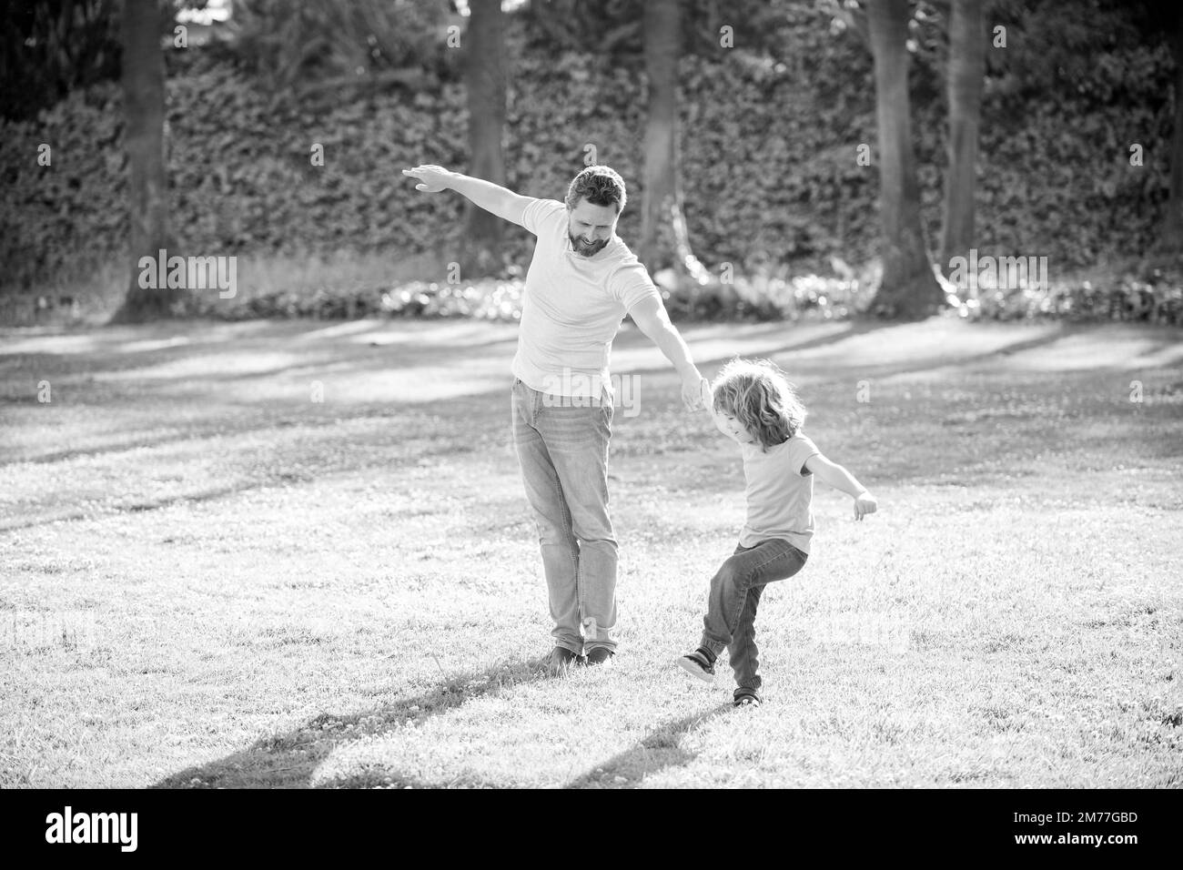 Enjoy every moment. Happy family enjoy summer outdoors. Playful father ...