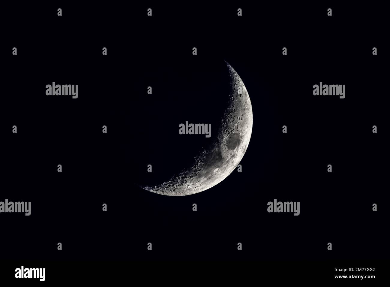 Close-up horizontal view of a new moon in a black sky in detail Stock ...