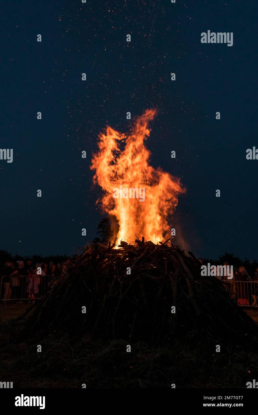 Flames with arms head and face from top of bonfire 2022 Stock Photo - Alamy