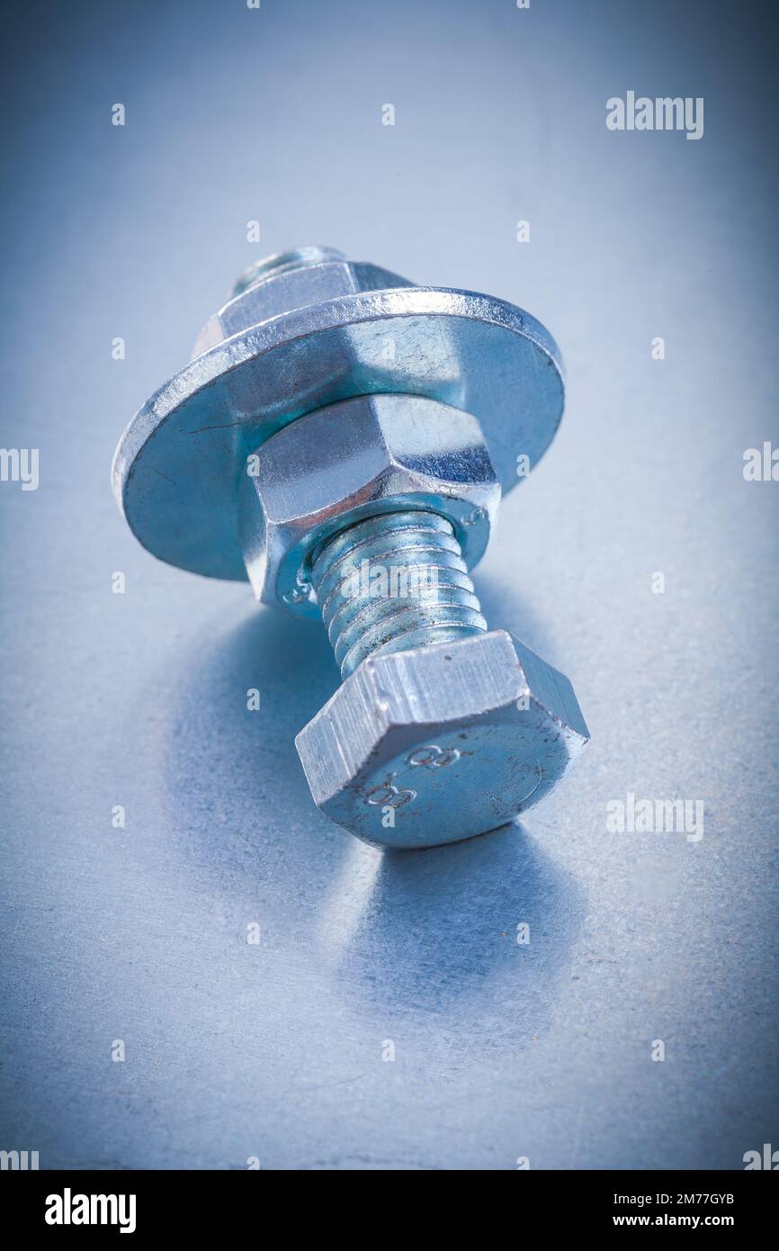 Threaded screwbolt with bolt washer and screw nuts on metallic ...