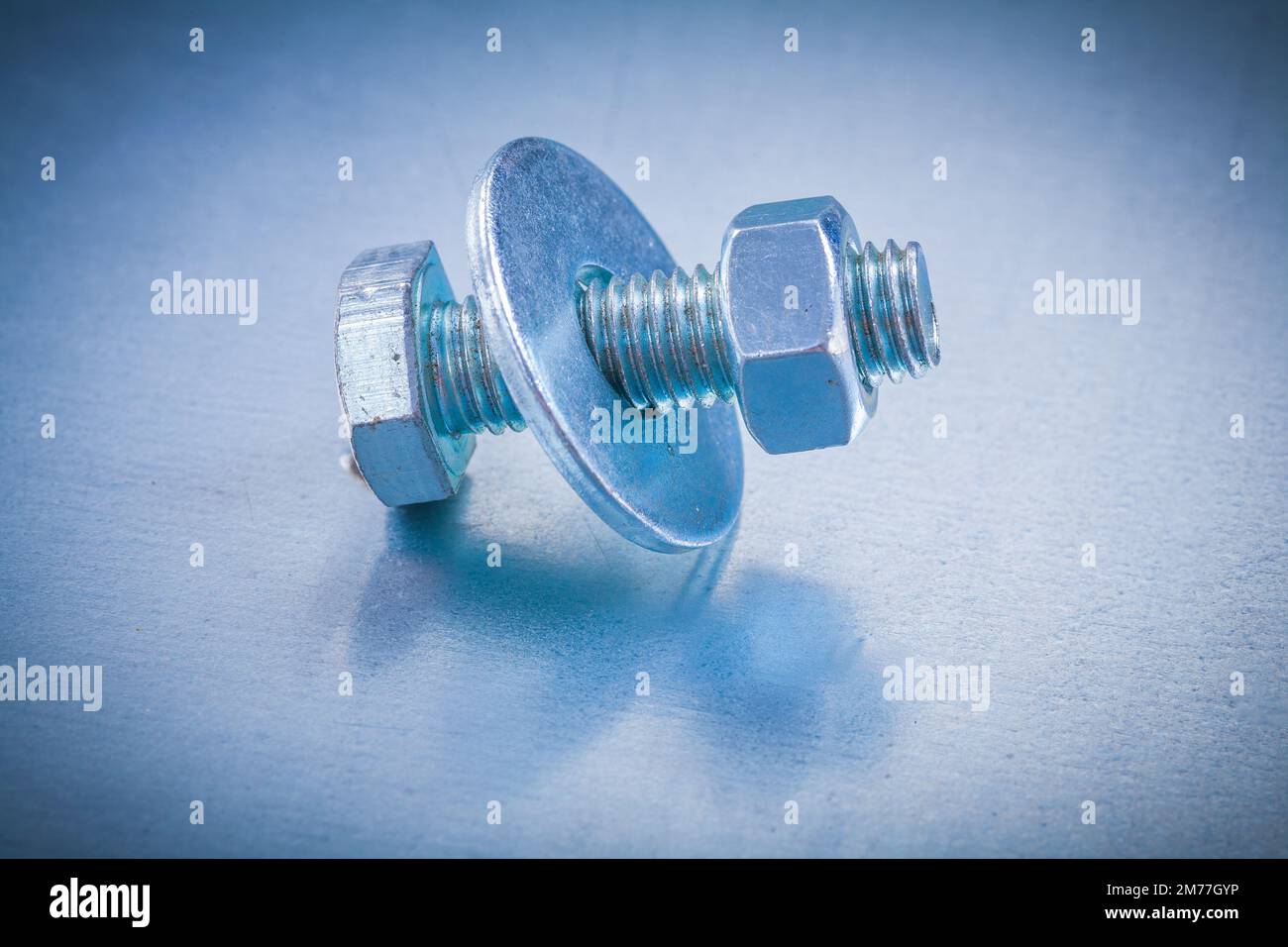 Threaded screwbolt with bolt washer and screw nut on metallic ...