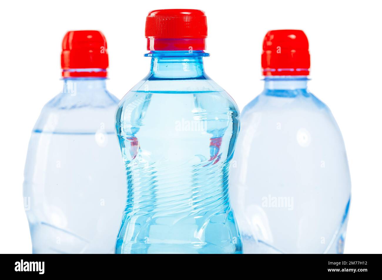 three tops of bottles of water Stock Photo - Alamy