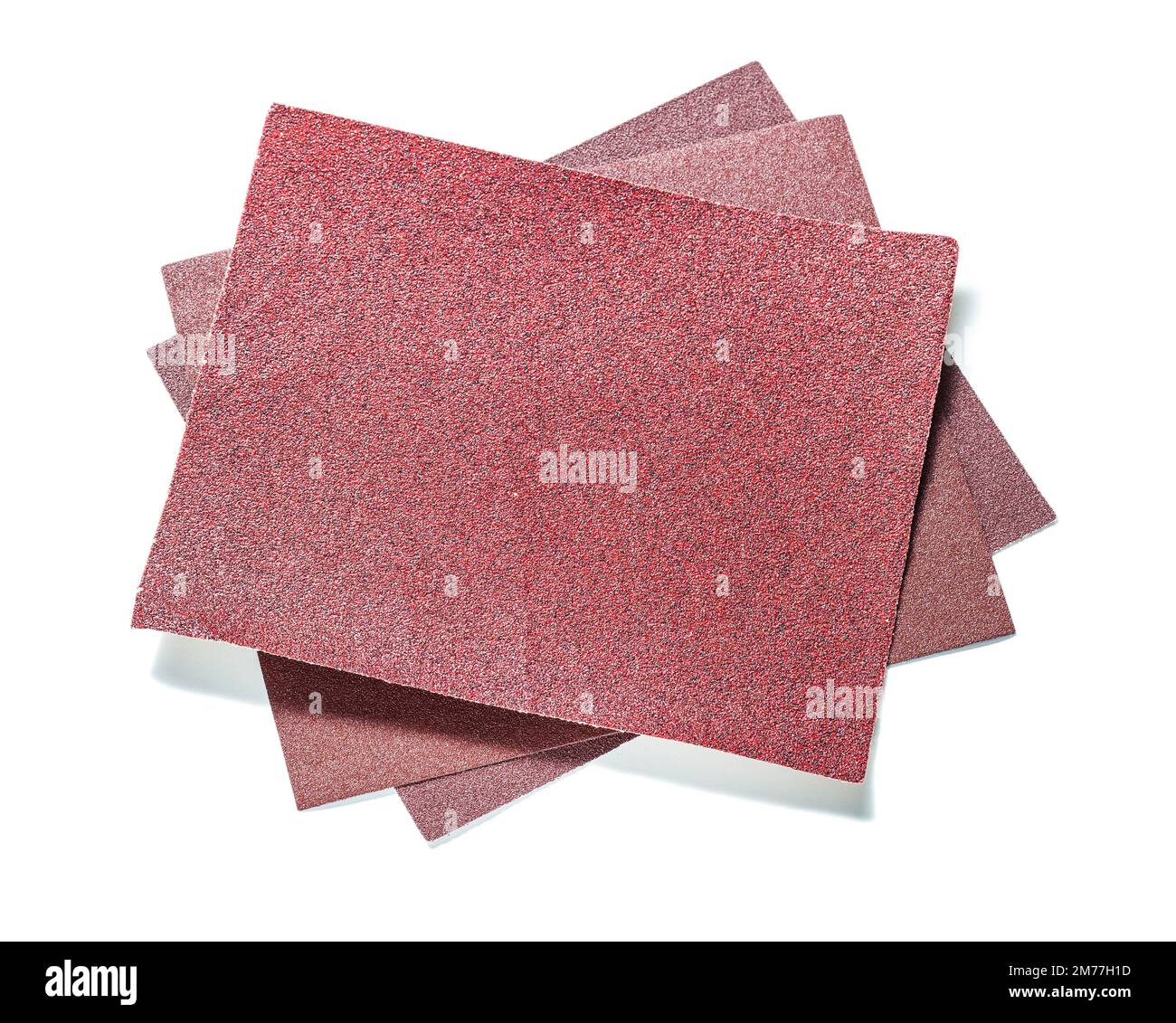 three red sheet of abrasive paper isolated on white Stock Photo - Alamy