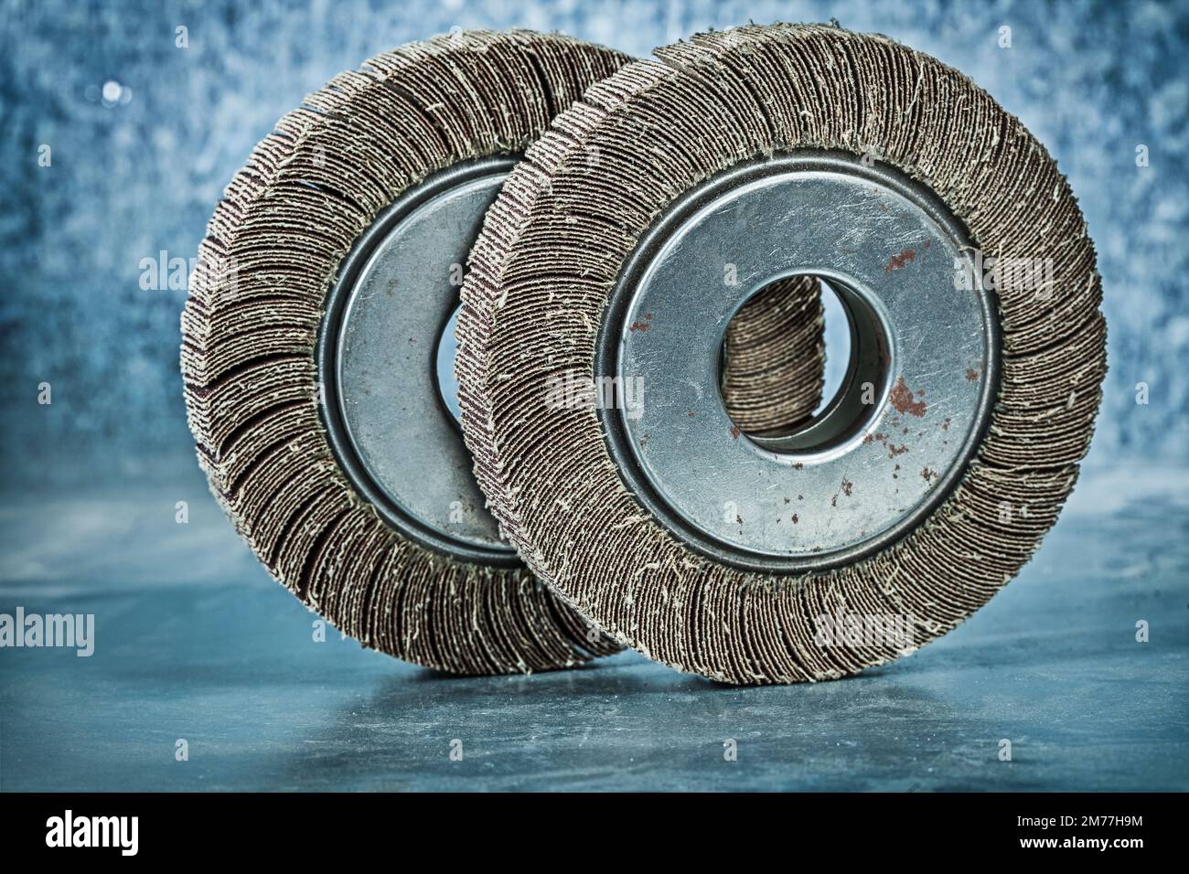 two abrasive flap discs on metalic background Stock Photo - Alamy