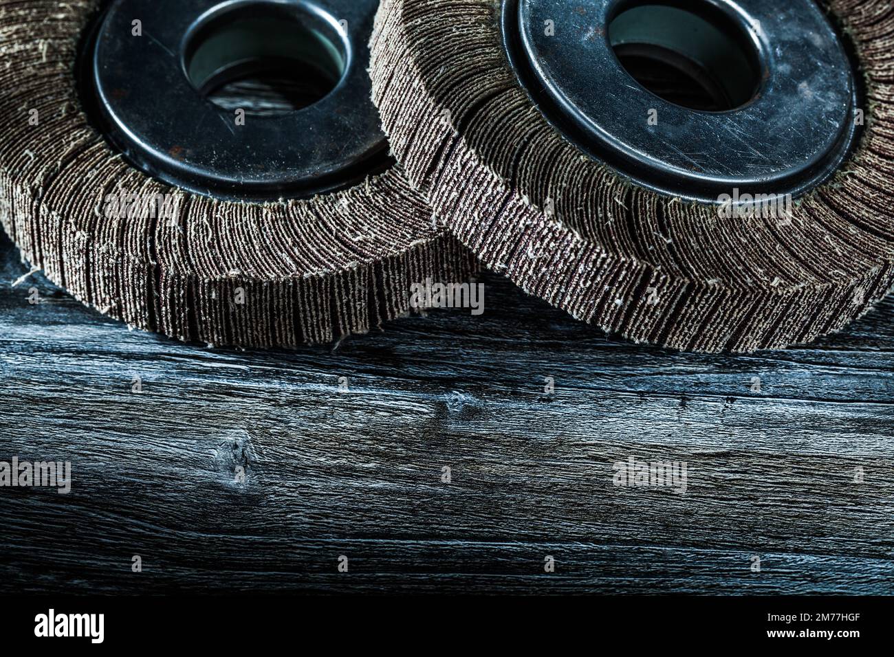 Used abrasive wheels on vintage wooden board Stock Photo - Alamy