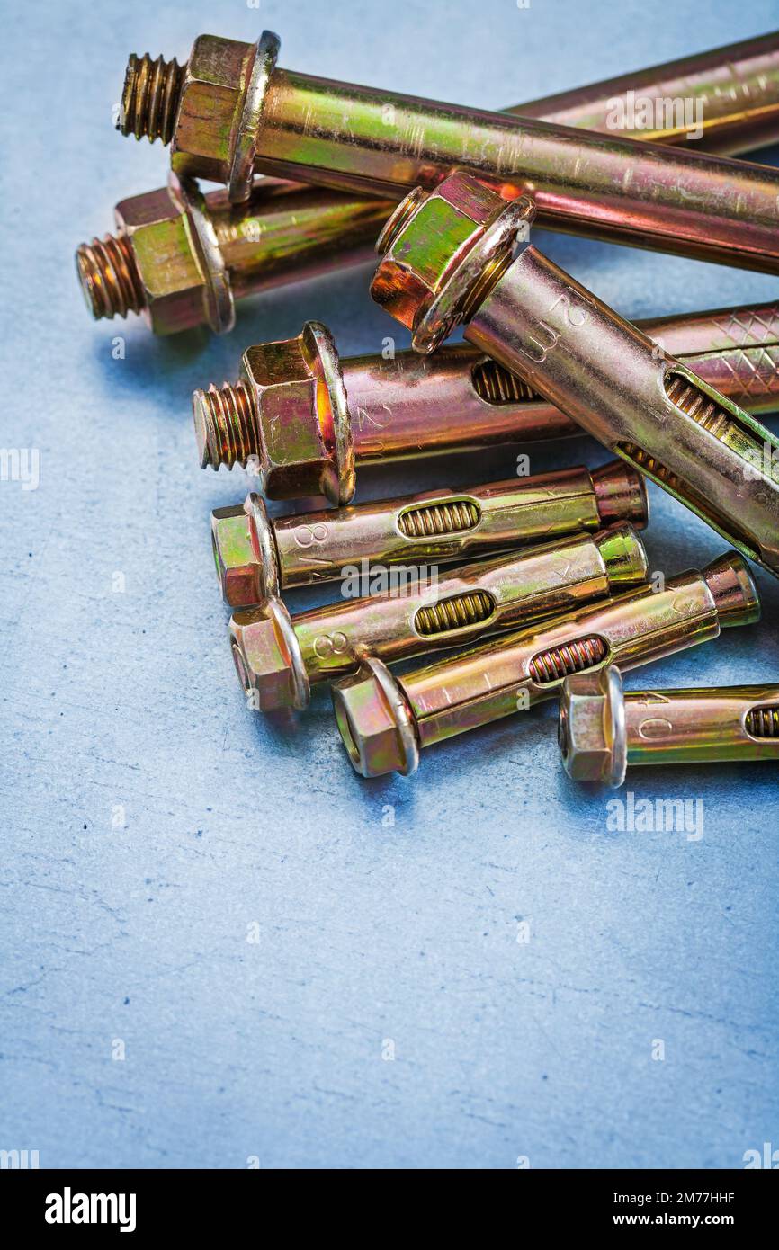 Variation of threaded anchor bolts with screw nuts on metallic ...