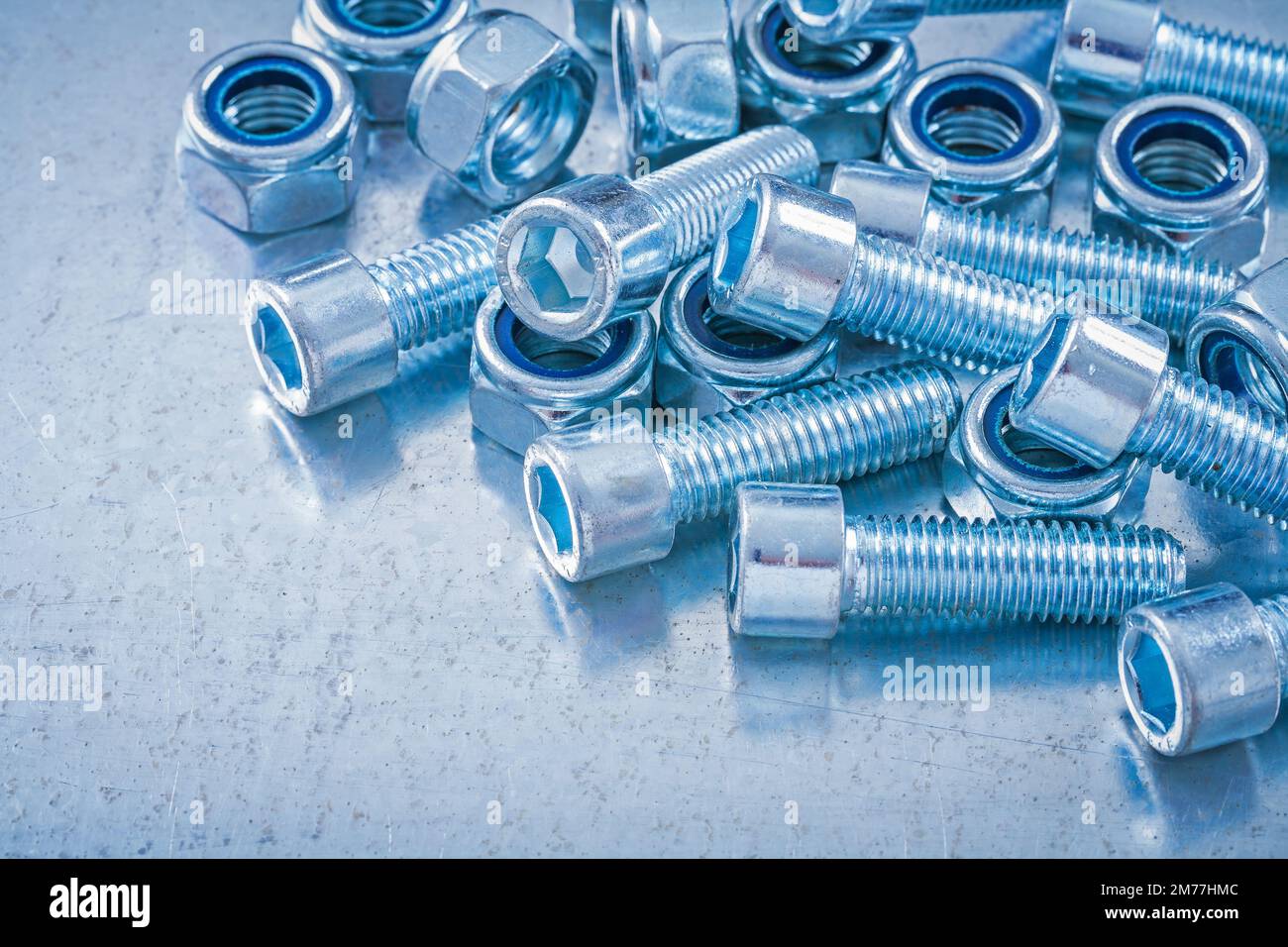 Variation of threaded metal screw nuts and bolt details on metallic ...