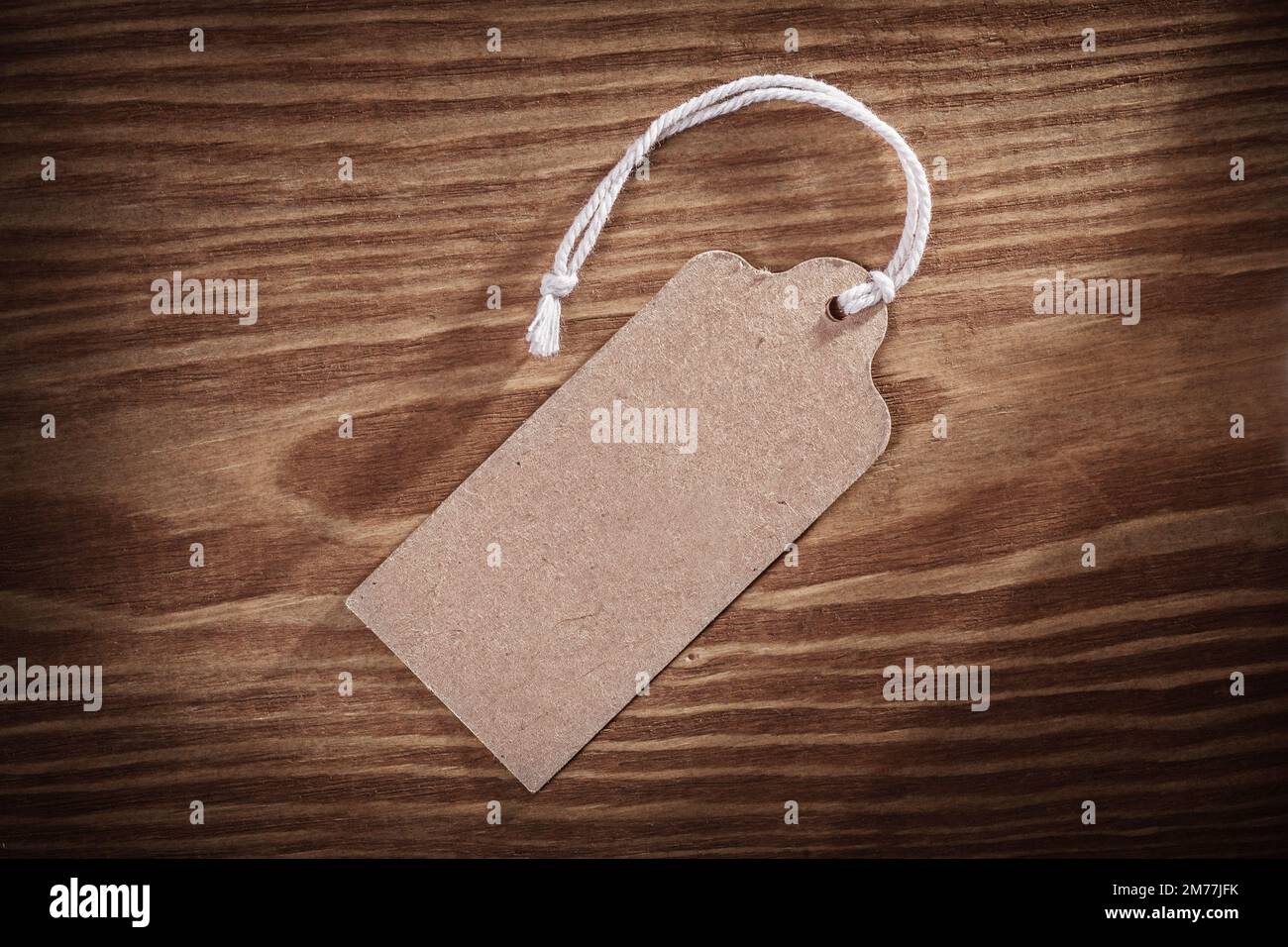 vintage paper price tag label on old wooden boards close up Stock Photo ...