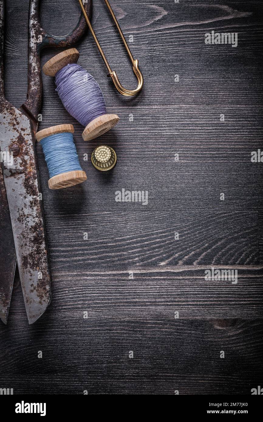 Vintage rusty scissors spools of thread thimble safety pin Stock Photo ...