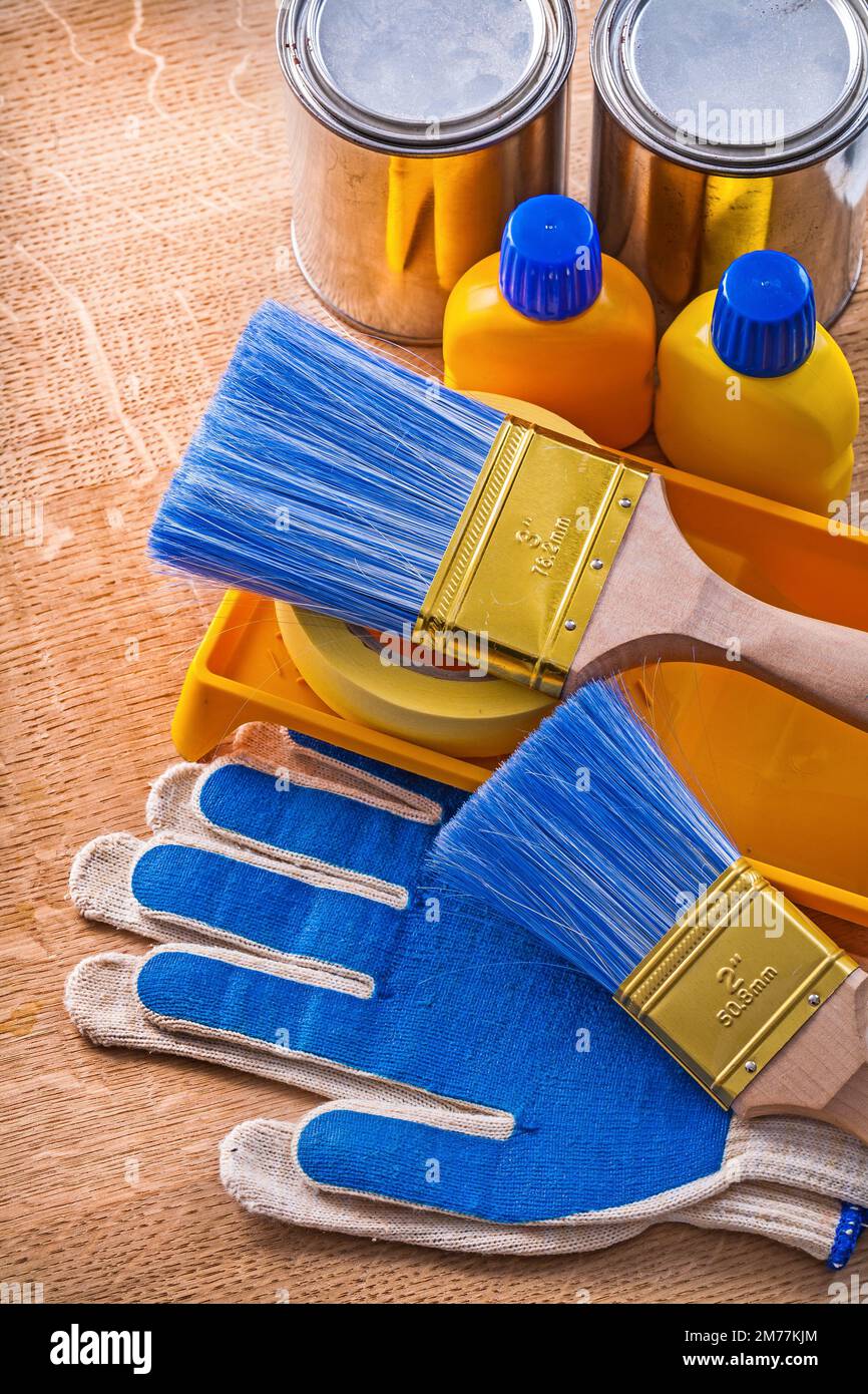 Wooden board with group of paint tools construction concept Stock Photo ...
