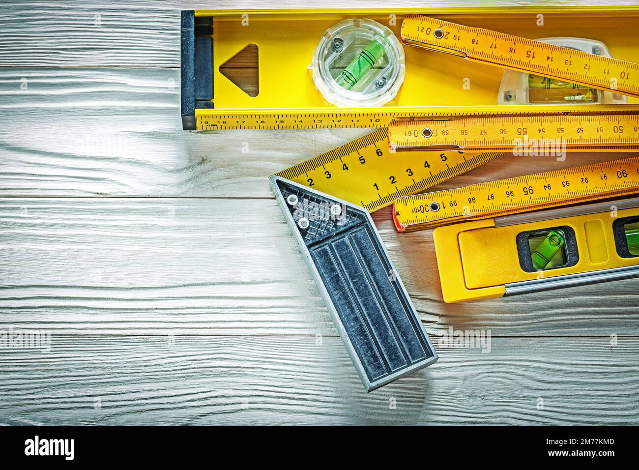Wooden meter construction level try square on white board Stock Photo ...