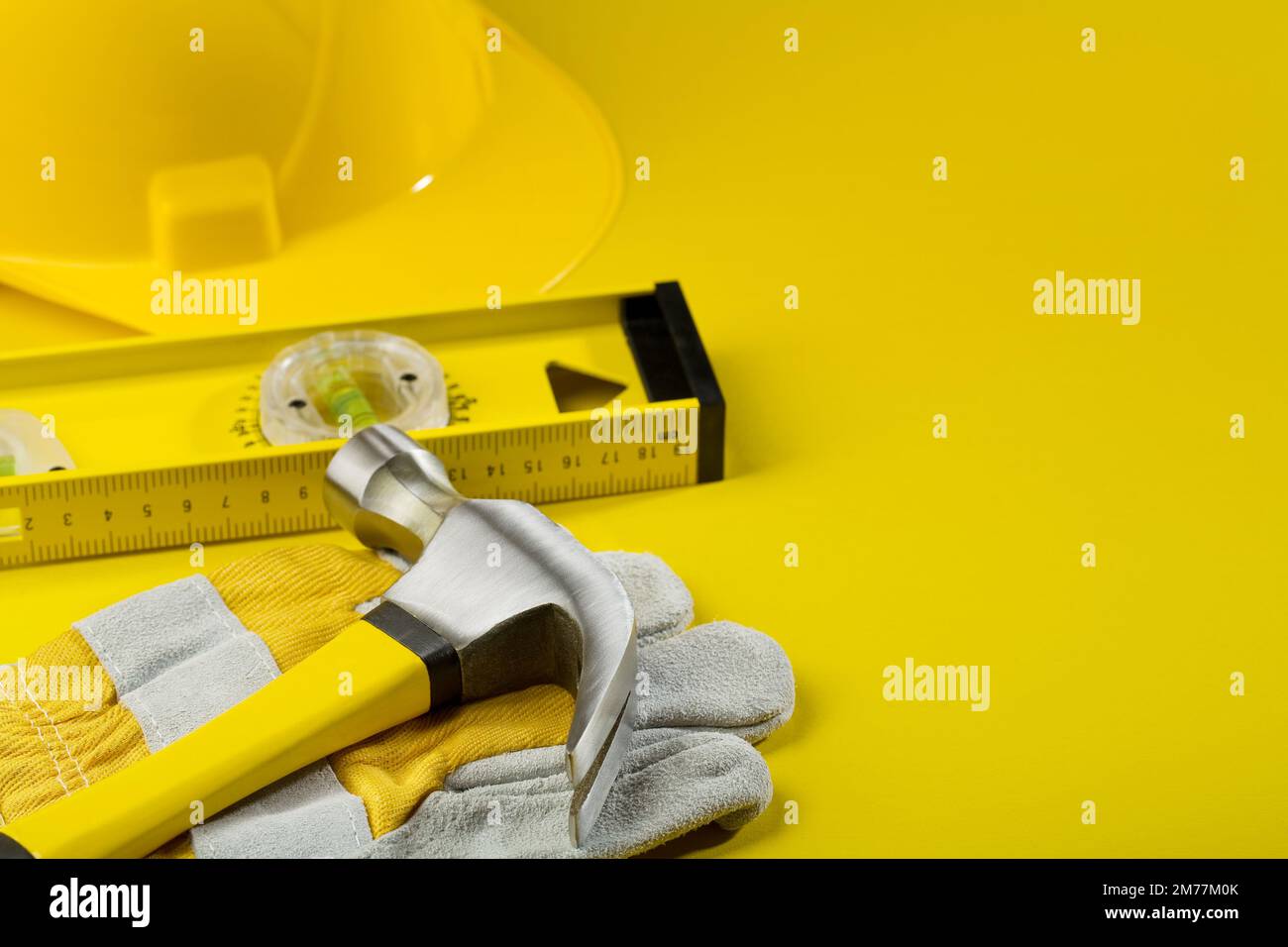 Tools on yellow background hi-res stock photography and images - Alamy
