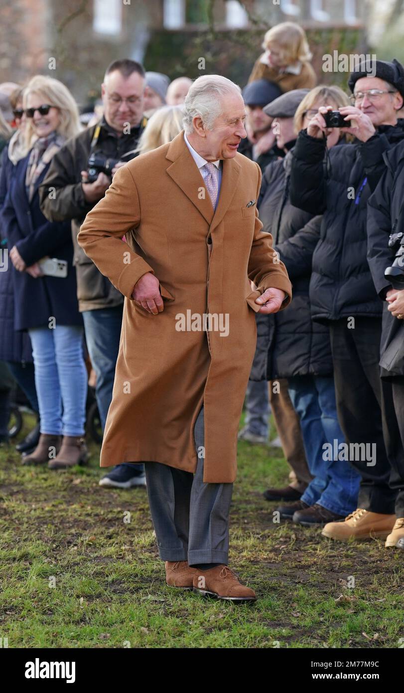 King Charles III speaks to well wishers as he arrives to attend a ...