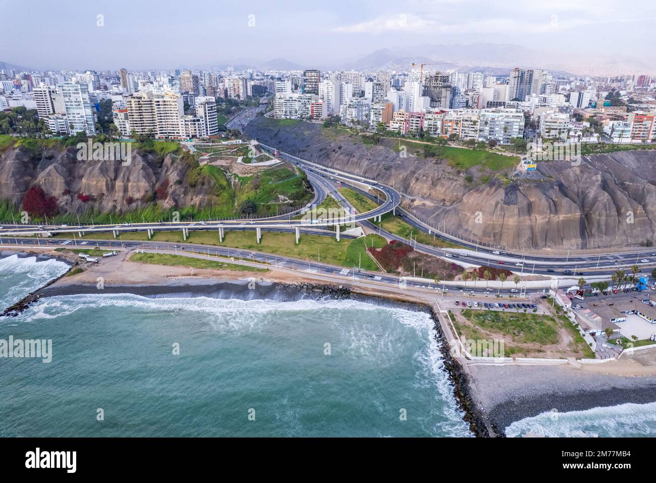 Aerial view of La Costa Verde and the Miraflores boardwalk in Lima ...