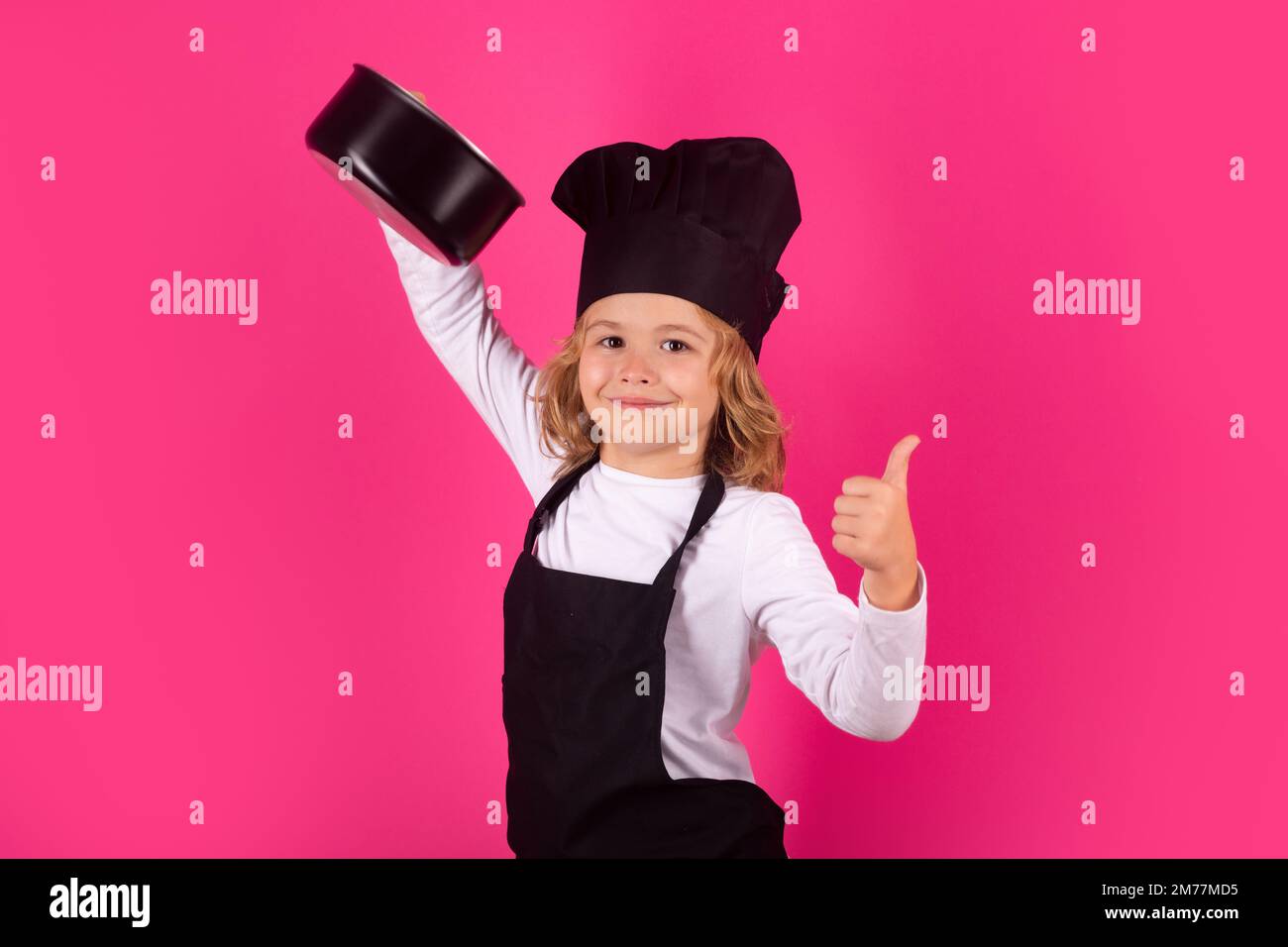 Kid chef cook with cooking pot. Chef kid preparing healthy food ...