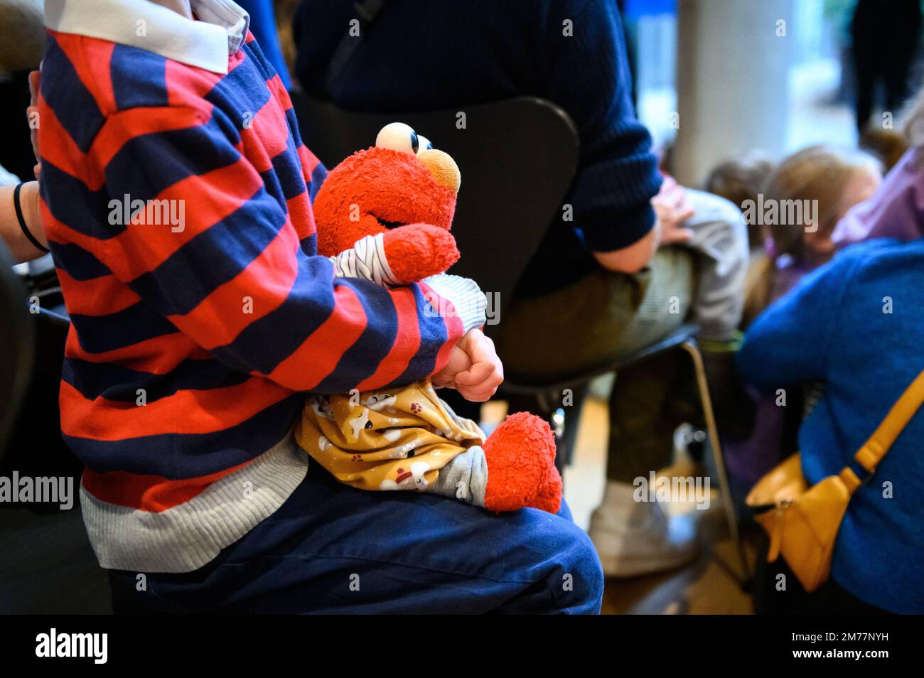 Hamburg, Germany. 08th Jan, 2023. A boy sits in front of the podium ...