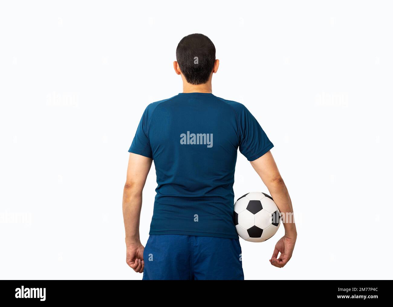 Soccer player holding ball under hi-res stock photography and images ...