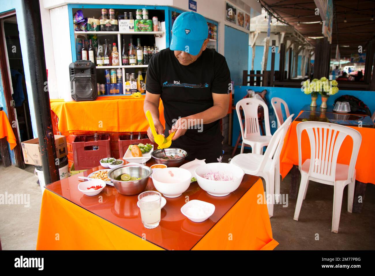 Preparing a delicious Peruvian sea bass ceviche in the fishing port of ...