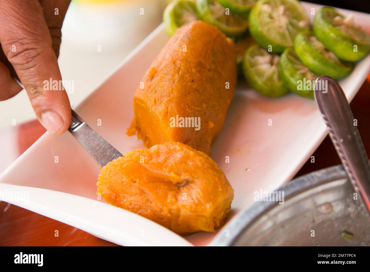 Preparing a delicious Peruvian sea bass ceviche in the fishing port of ...