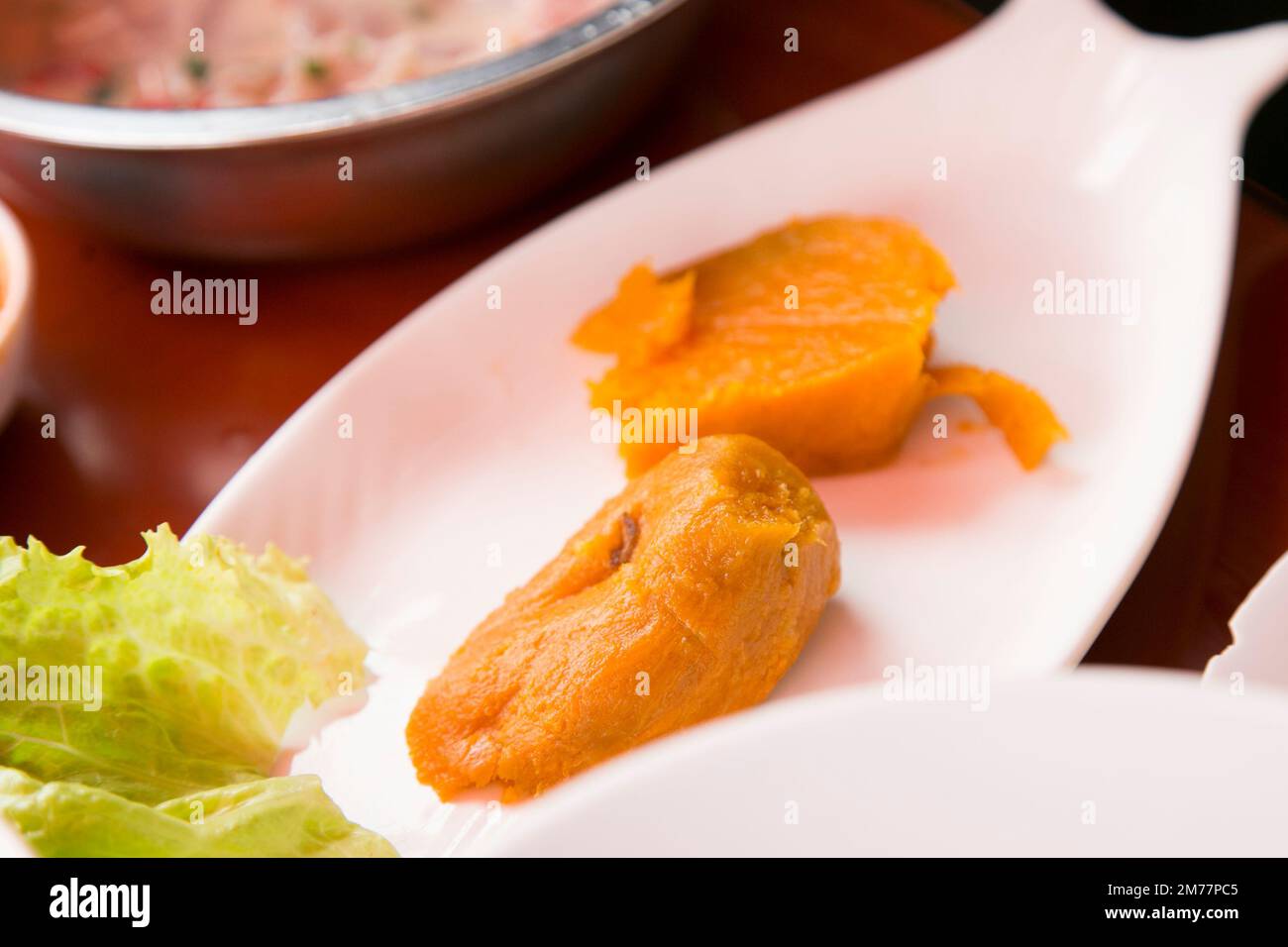 Preparing a delicious Peruvian sea bass ceviche in the fishing port of ...