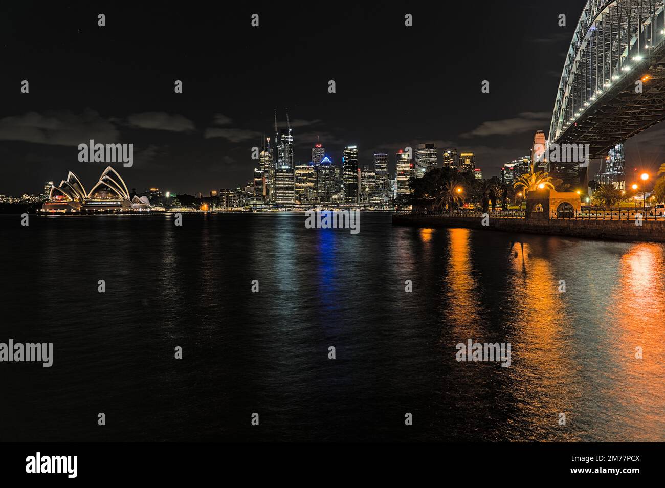 Sydney Opera House at night from Milsons Point and with skyline in the ...