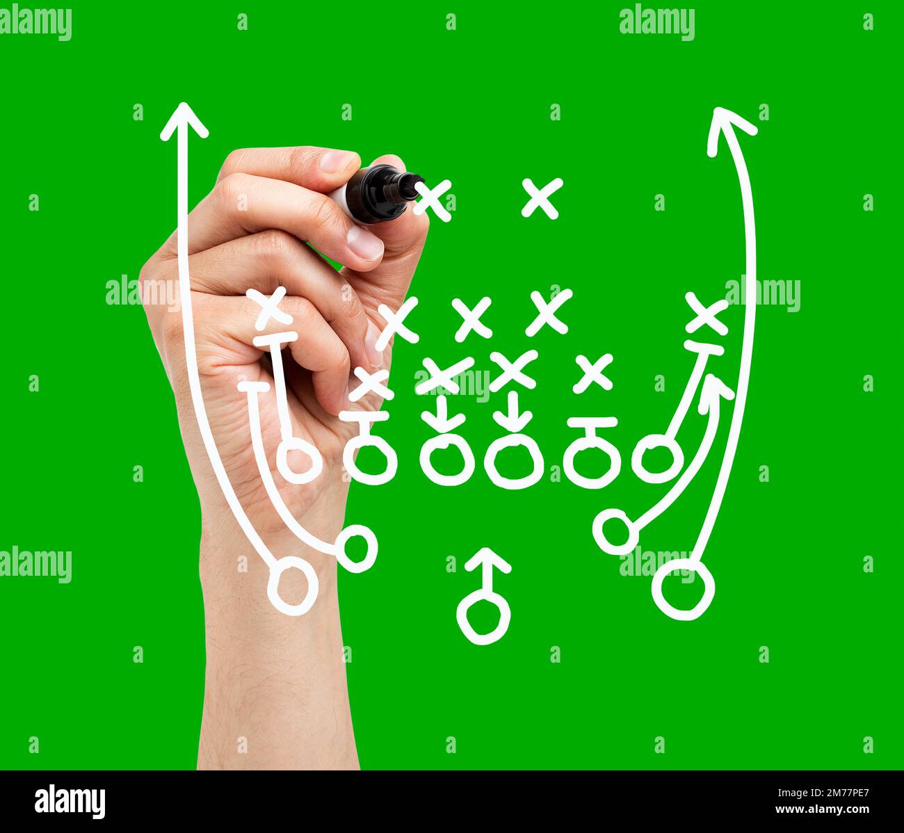 Coach drawing american football or rugby game playbook, strategy and ...