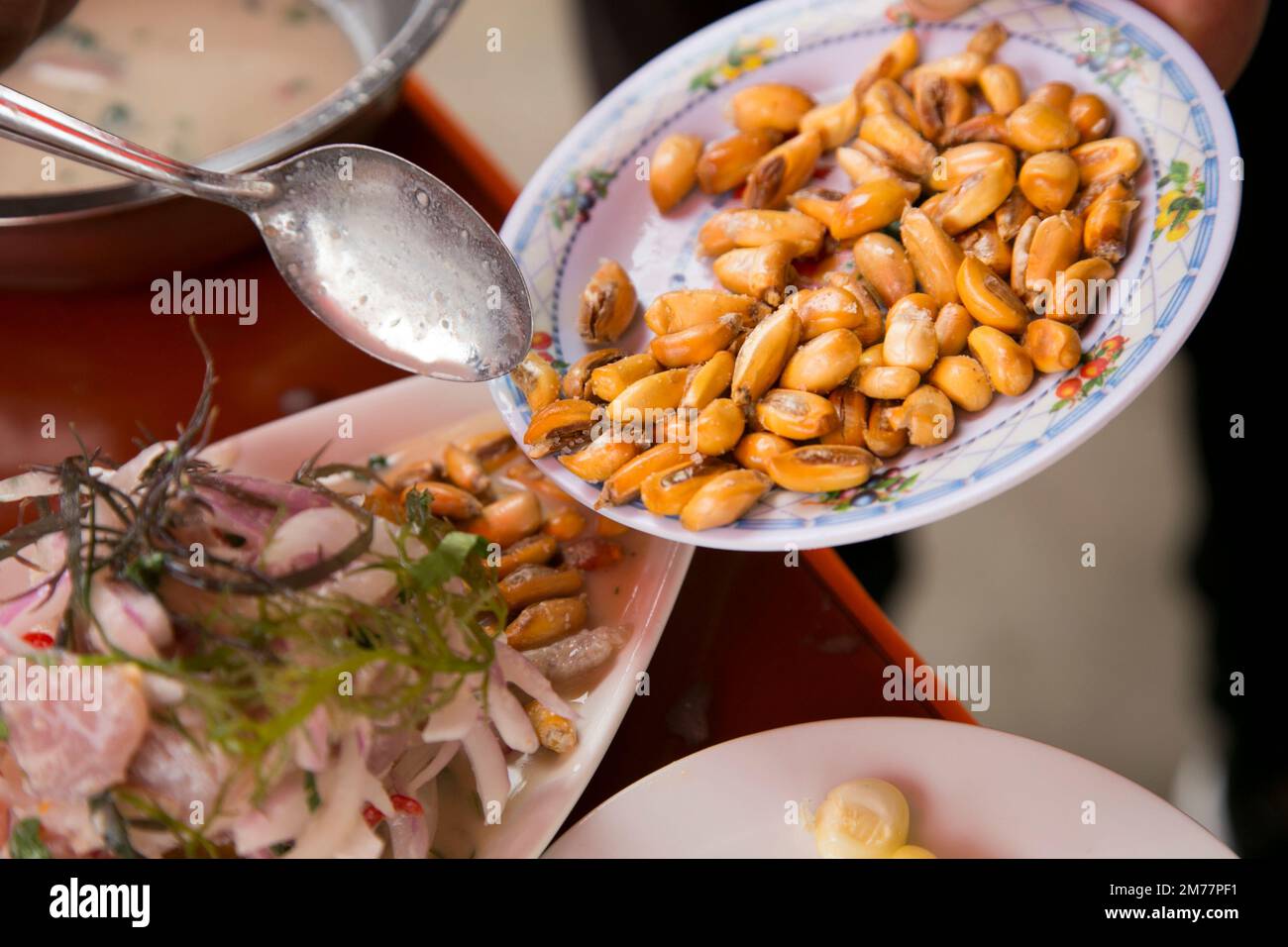Preparing a delicious Peruvian sea bass ceviche in the fishing port of ...