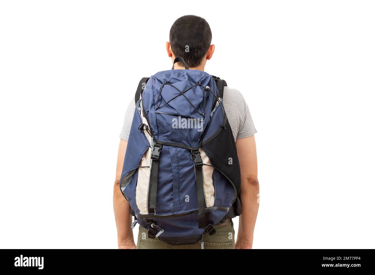 The back of the man with big blue backpack on the white background ...