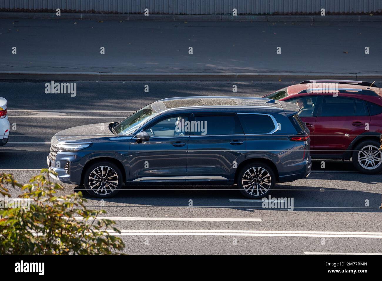 Moscow, Russia - September 27, 2022: Chinese crossover Exeed VX rides ...